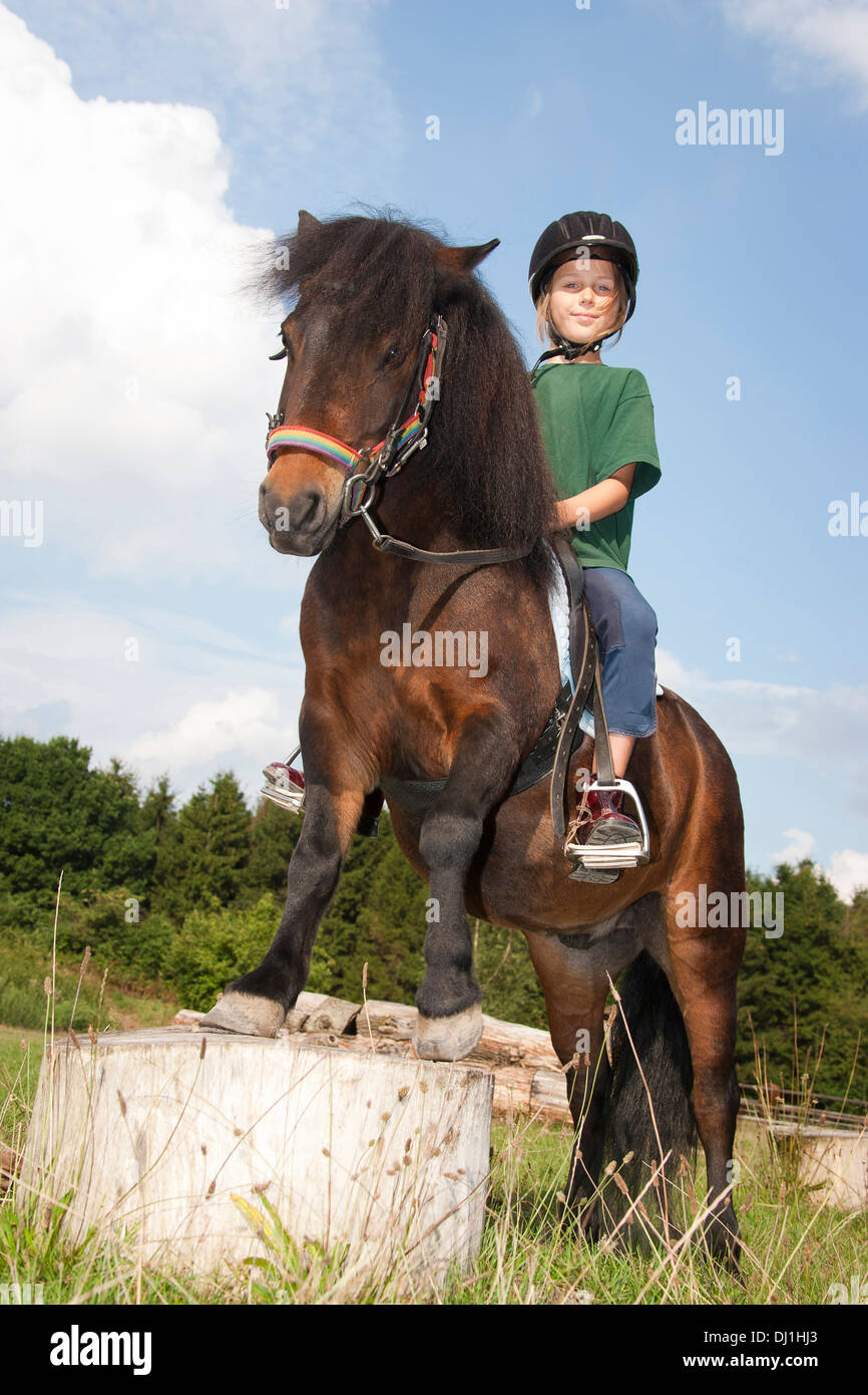 Girl riding bay dressage horse hi-res stock photography and images - Alamy
