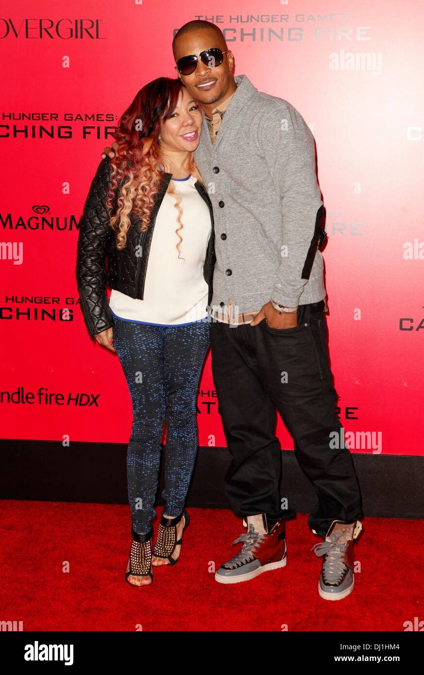 Los Angeles, CA, USA. 18th Nov, 2013. Tameka “Tiny” Cottle, T.I. at ...