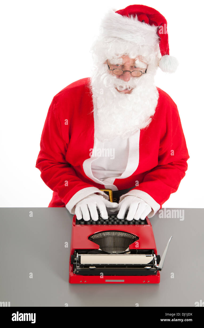 Santa Claus writing a letter with old typewriter Stock Photo - Alamy
