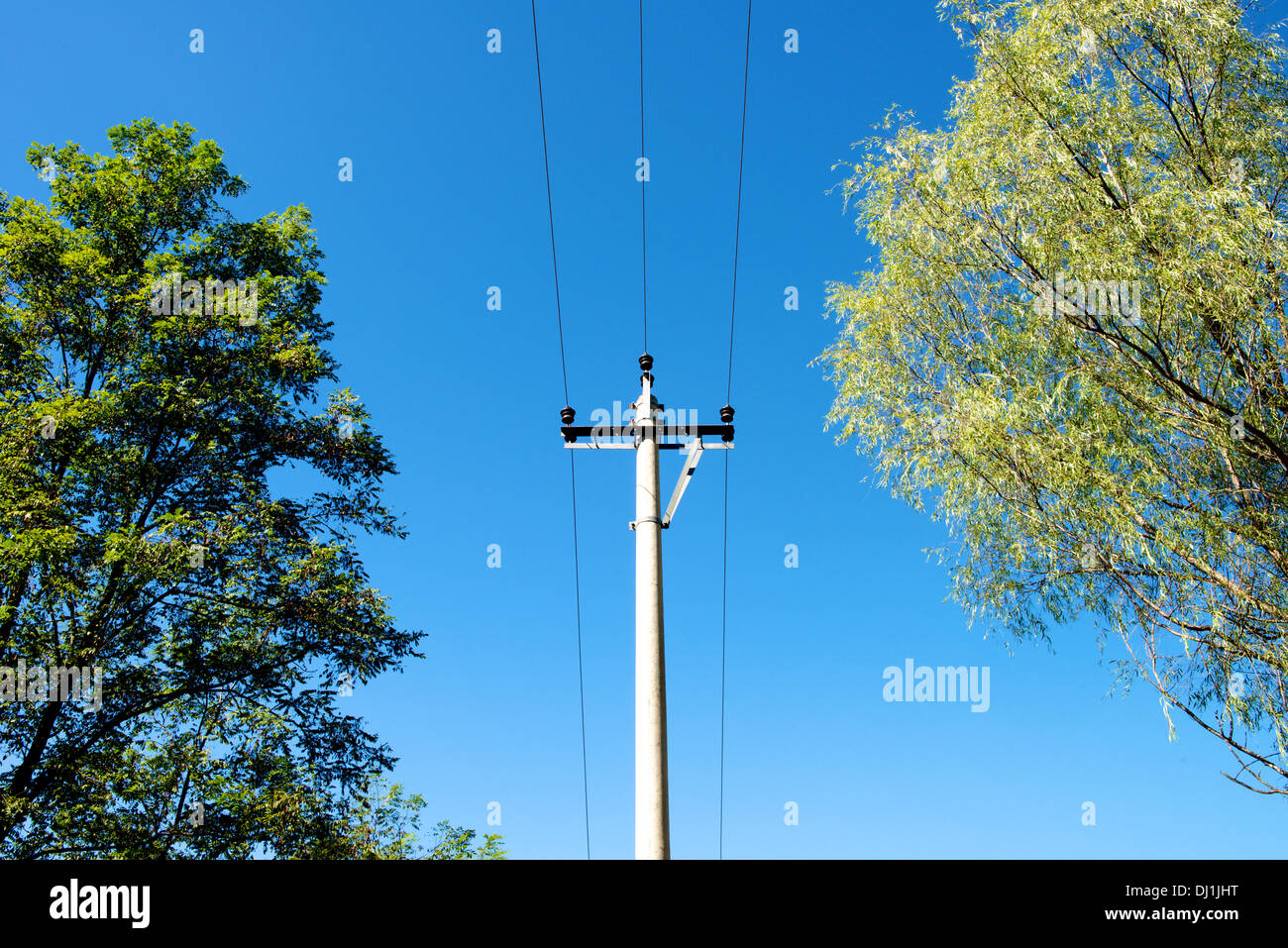 A telegraph pole under blue sky in china Stock Photo - Alamy