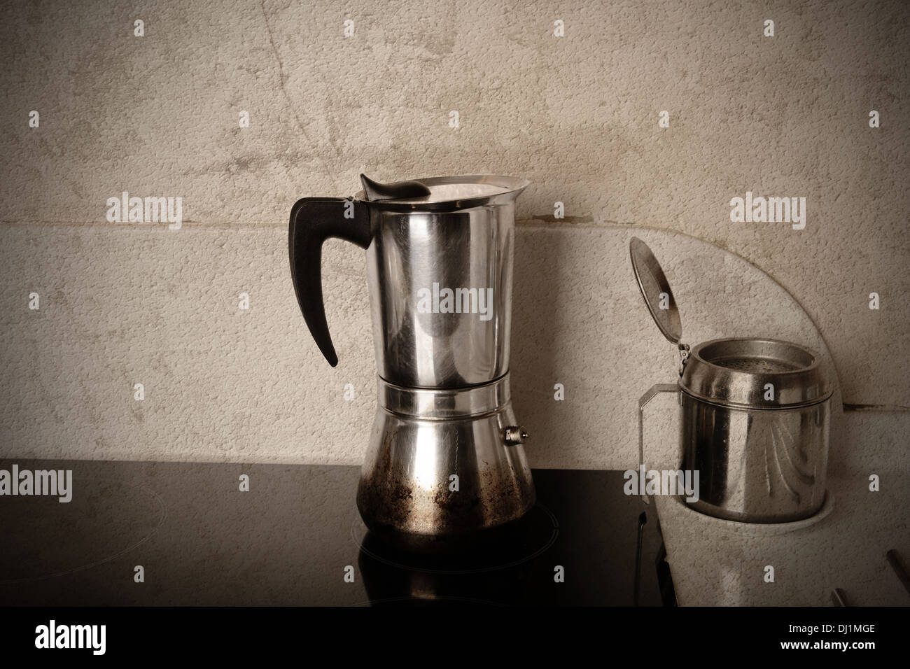 old metal kettle on an old kitchen Stock Photo - Alamy