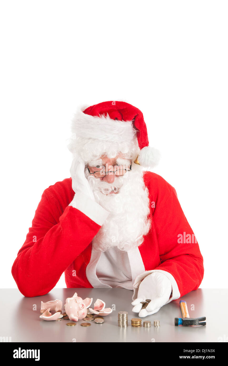 Santa had broken his piggy bank and is counting poor money Stock Photo ...