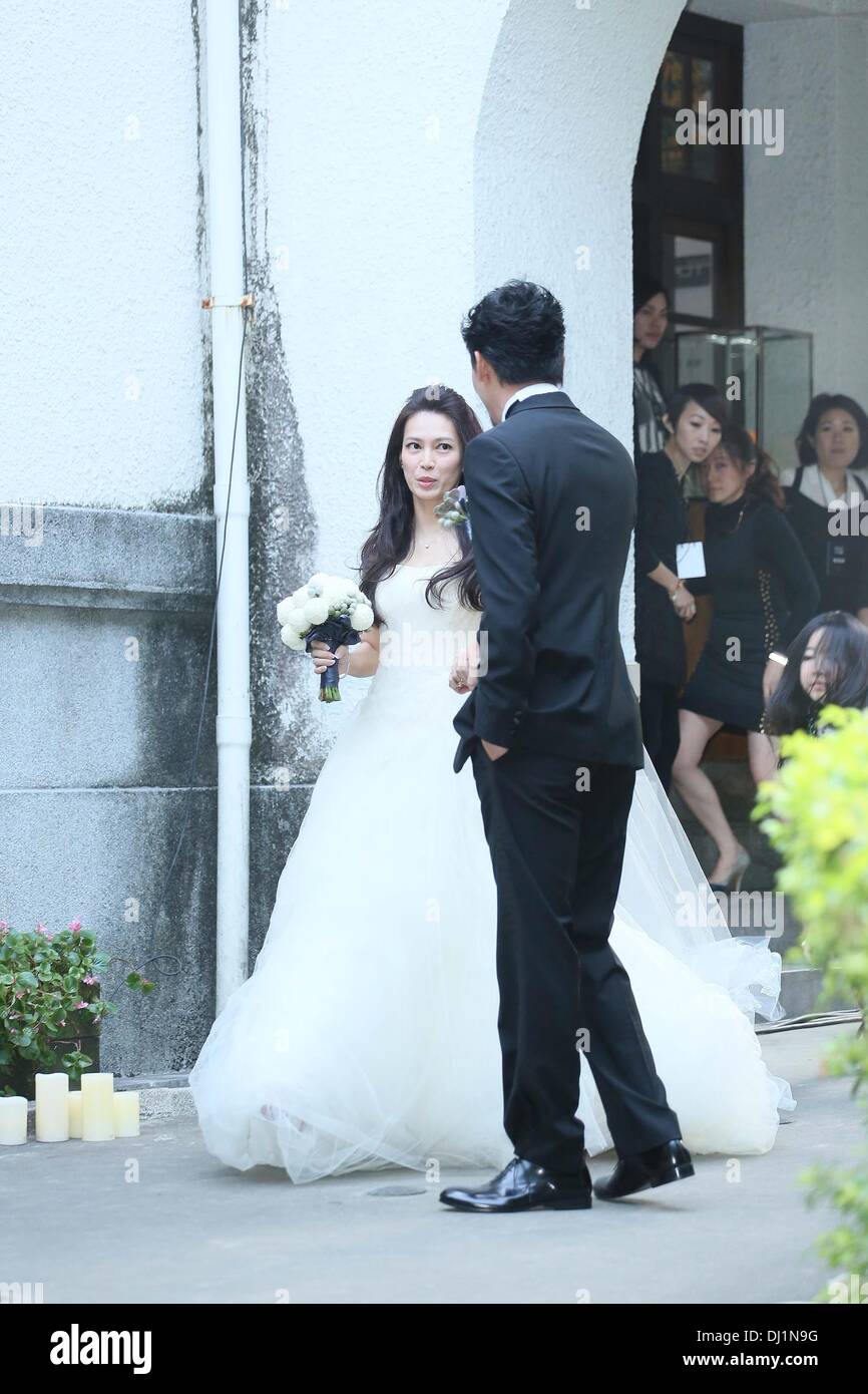Taipei, China. 18th Nov, 2013. Chang Chen and his wife pose for camera ...