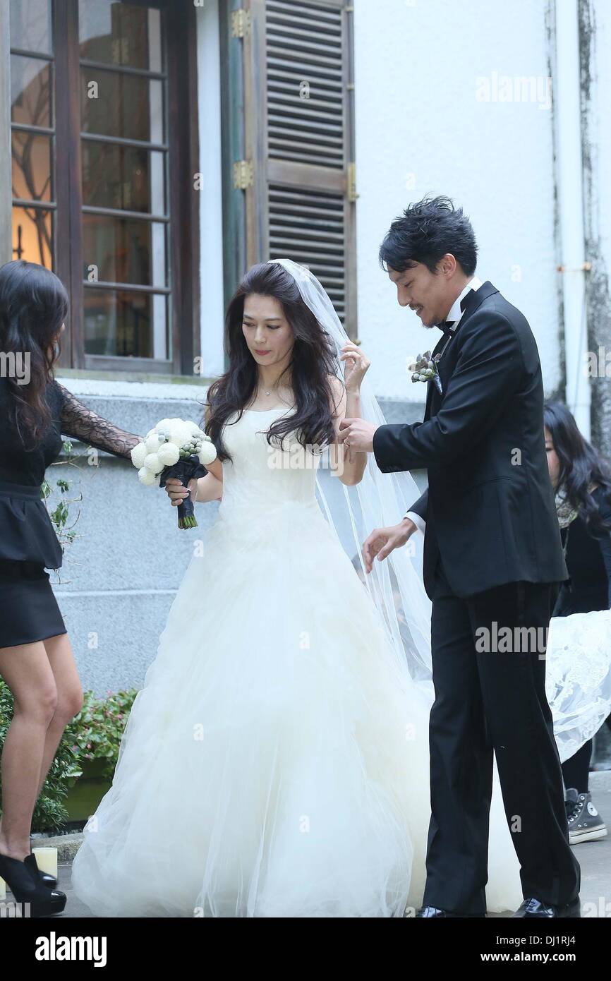 Taipei, China. 18th Nov, 2013. Chang Chen and his wife pose for camera ...