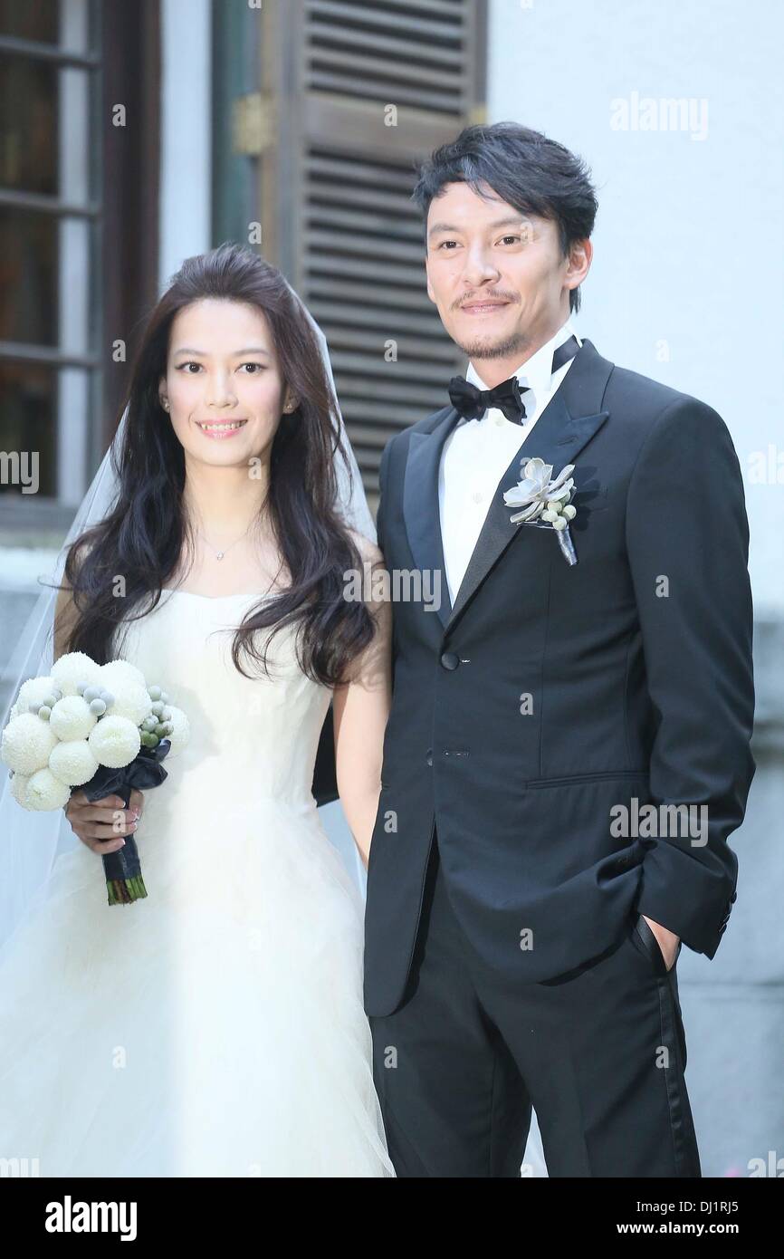 Taipei, China. 18th Nov, 2013. Chang Chen and his wife pose for camera ...
