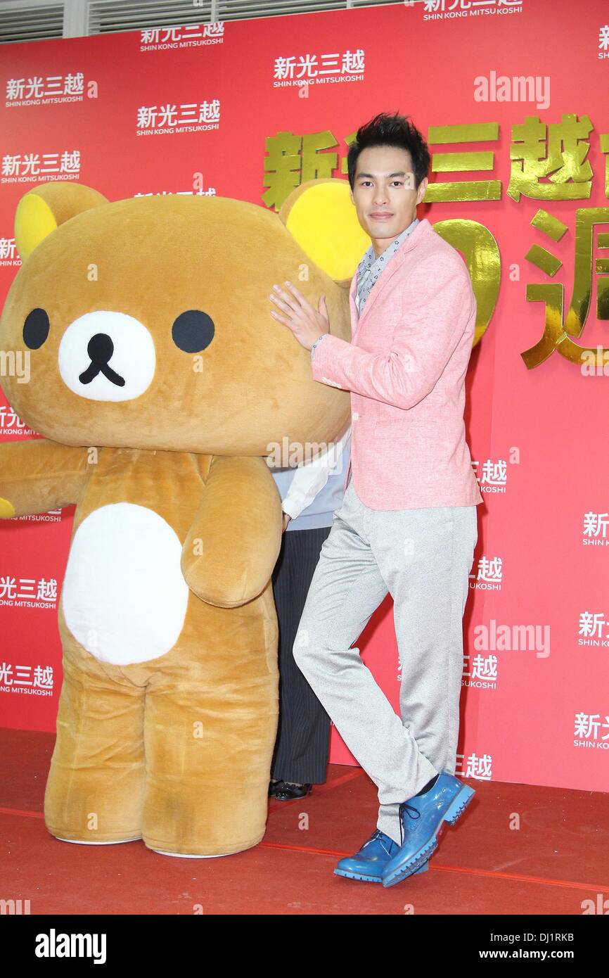 Taipei, China. 18th Nov, 2013. Actor Tony Yang attends commercial ...