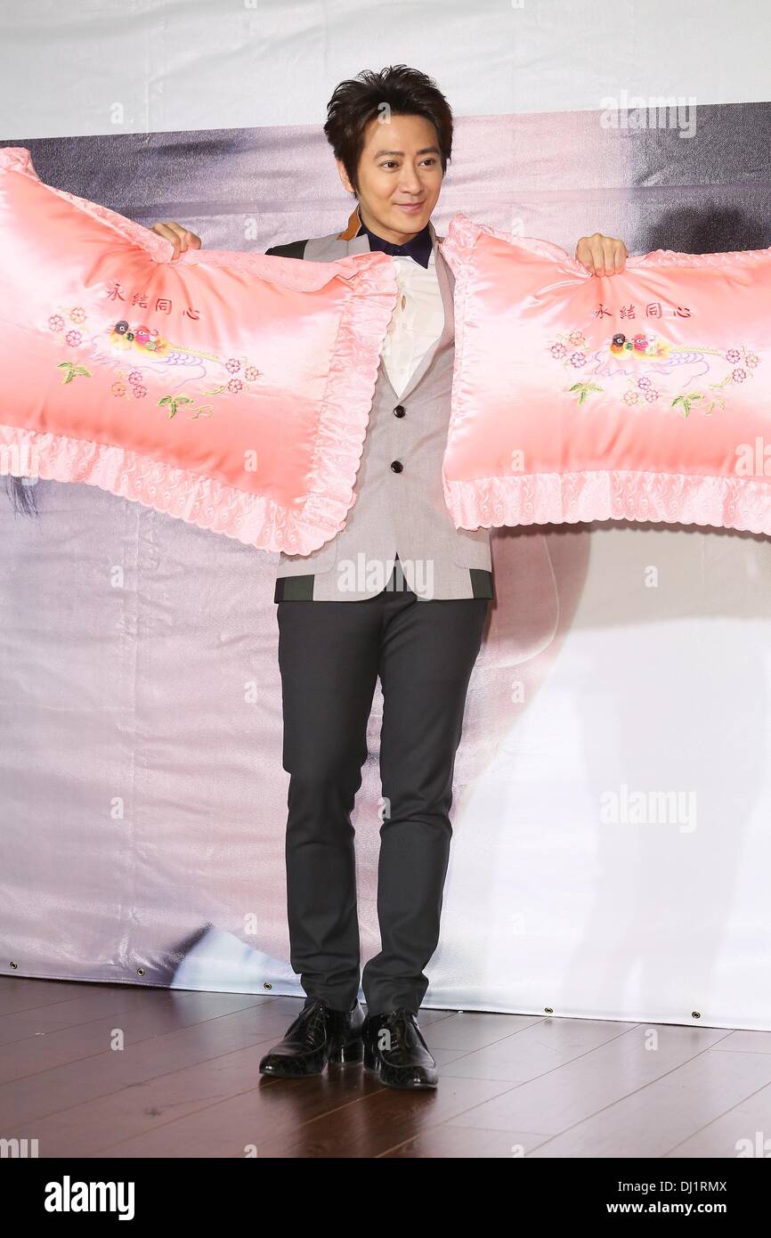 Taipei, China. 18th Nov, 2013. Singer Eric Suen promotes his new album ...