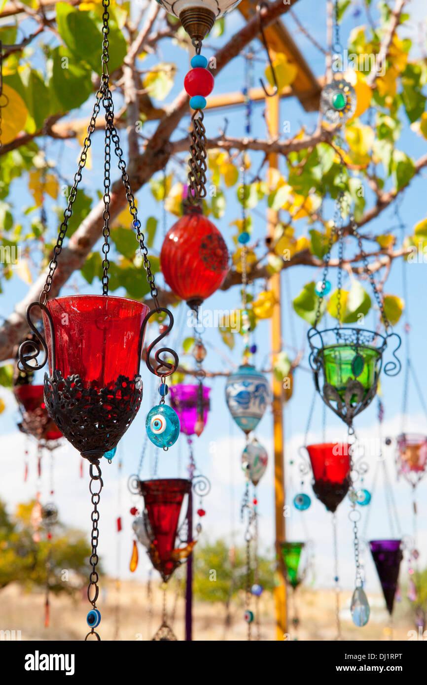 Traditional Turkish souvenirs in the branches of a tree at a viewpoint ...
