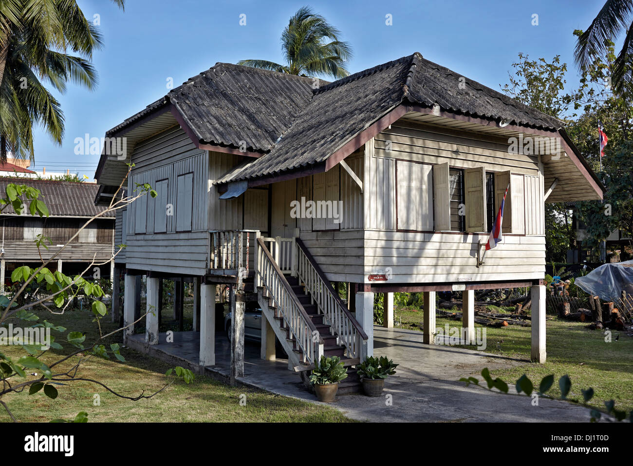 Traditional wooden Thai house elevated on stilts. Thailand S. E. Asia ...