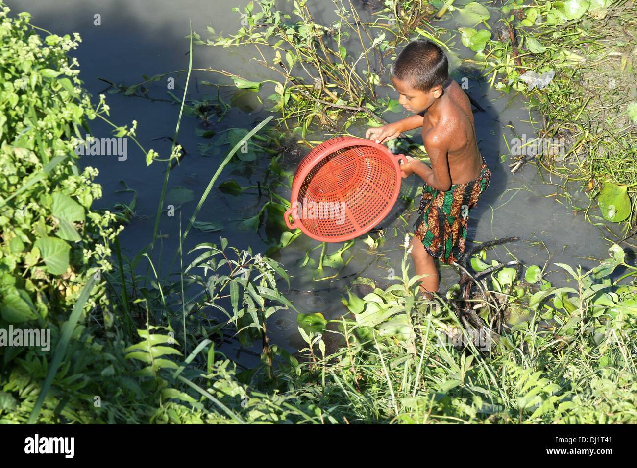 Boy Catches Fish High Resolution Stock Photography and Images - Alamy