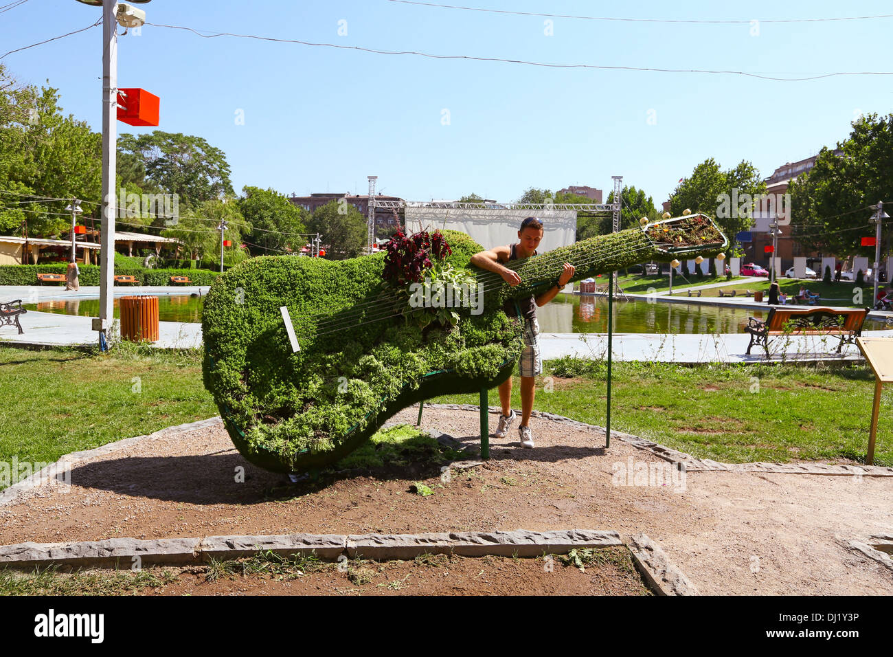 Musician playing decorative guitar in Yerevan city, Armenia Stock Photo ...