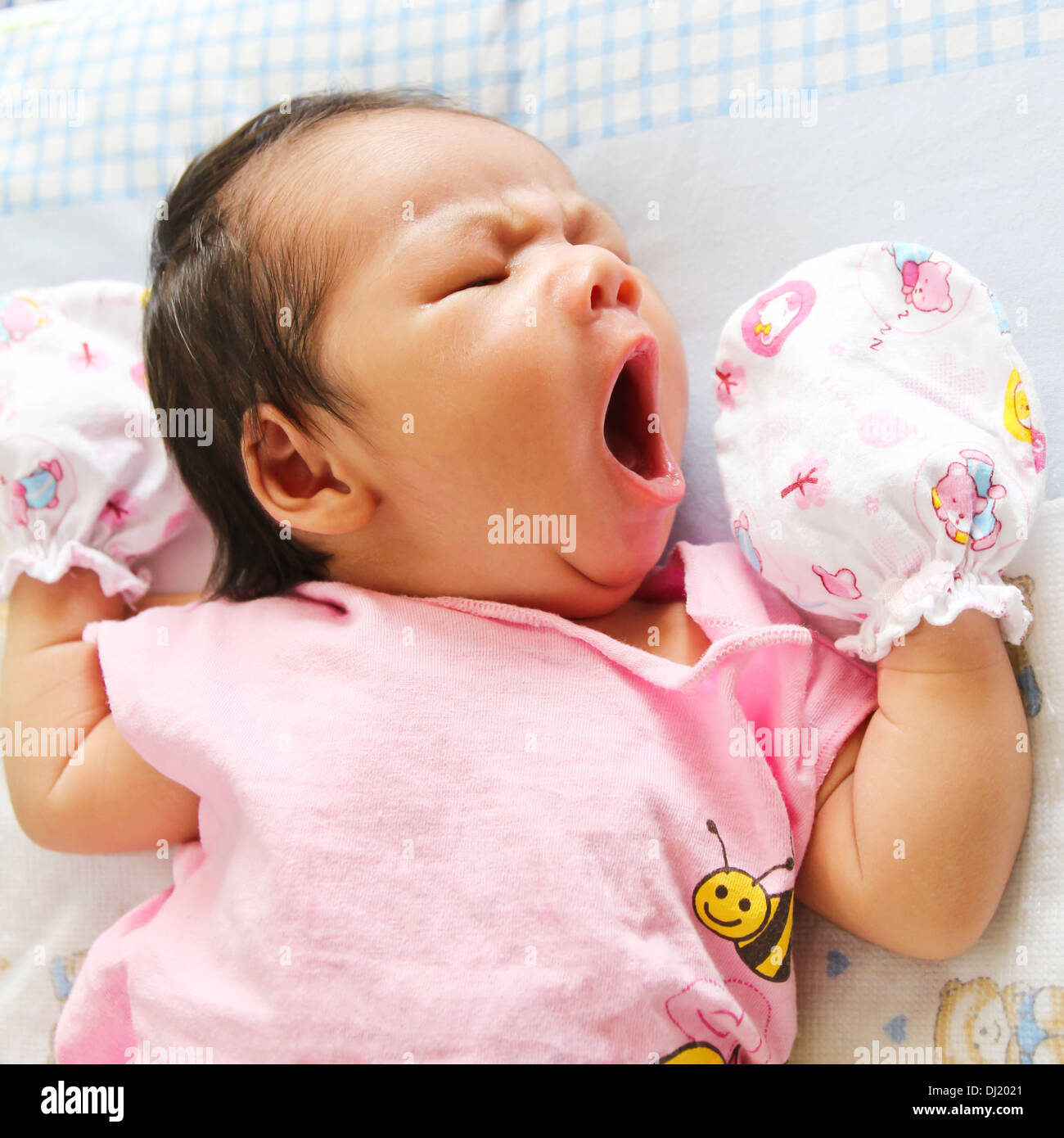 Newborn Asian baby girl lies on a blanket Stock Photo - Alamy