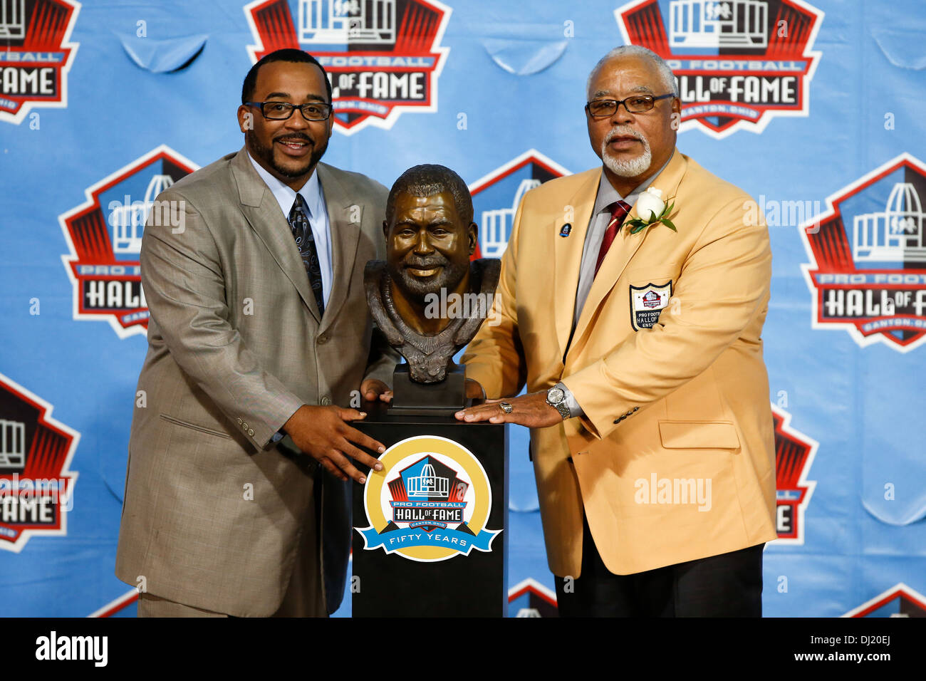 Curley Culp (R) and son Chad pose at the NFL Class of 2013 Enshrinement ...