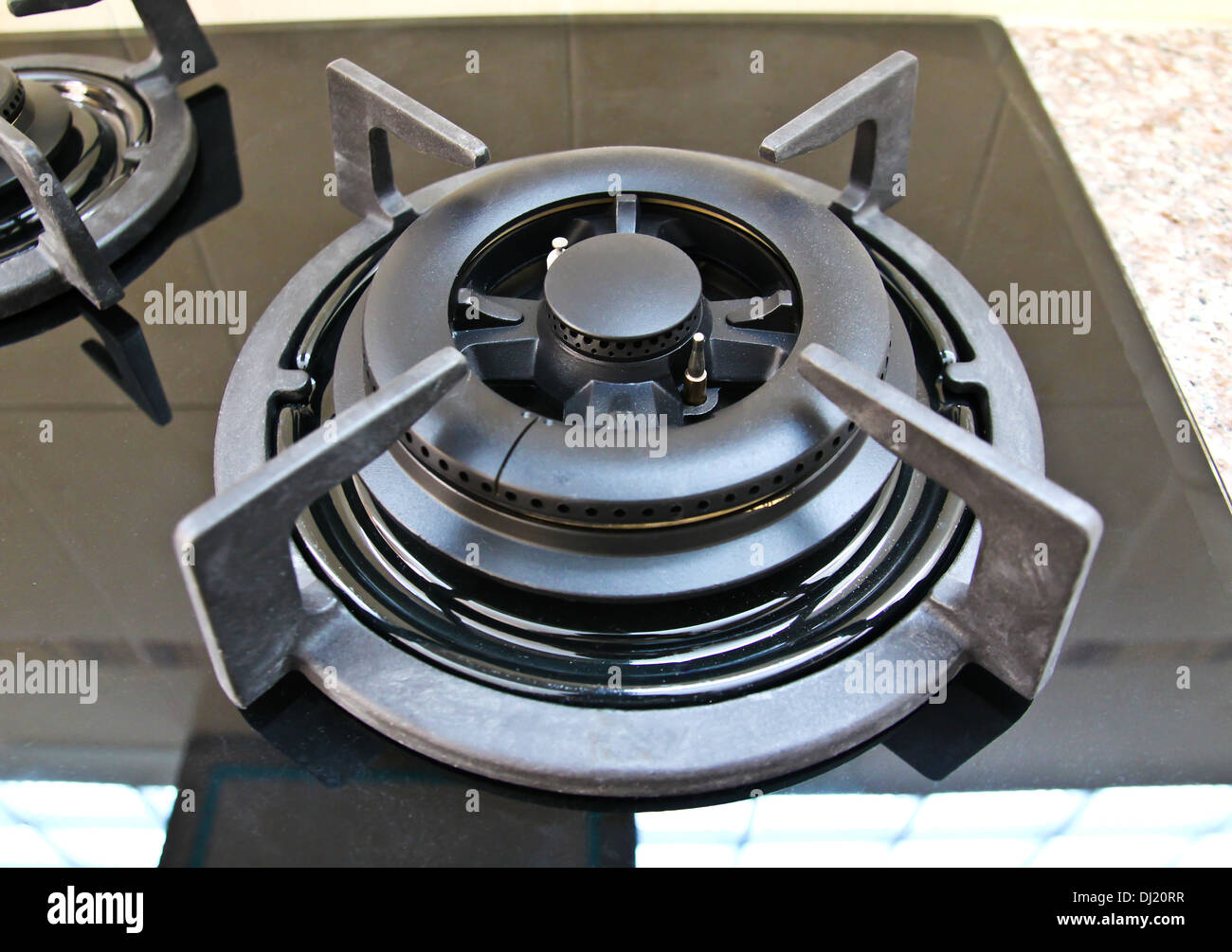 Black glass gas hob in kitchen Stock Photo - Alamy