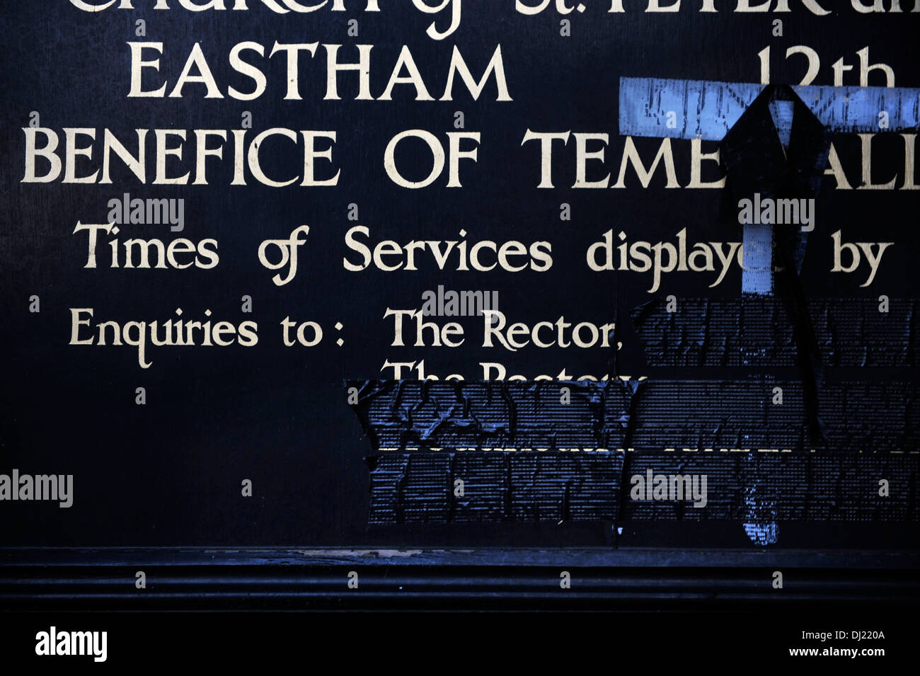 A hastily altered sign at The Church of St Peter and St Paul with the ...