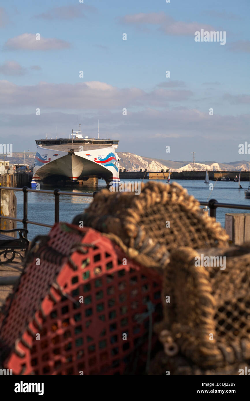 Condor Express catamaran ferry at Weymouth with lobster pots on the ...