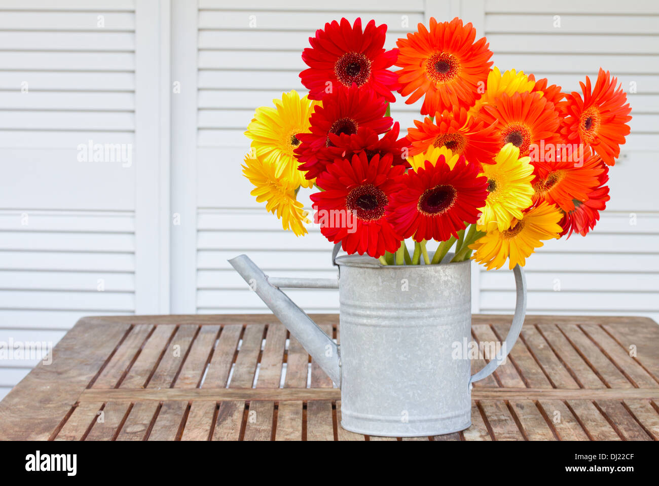 bouquet of gerberas on wooden table Stock Photo - Alamy