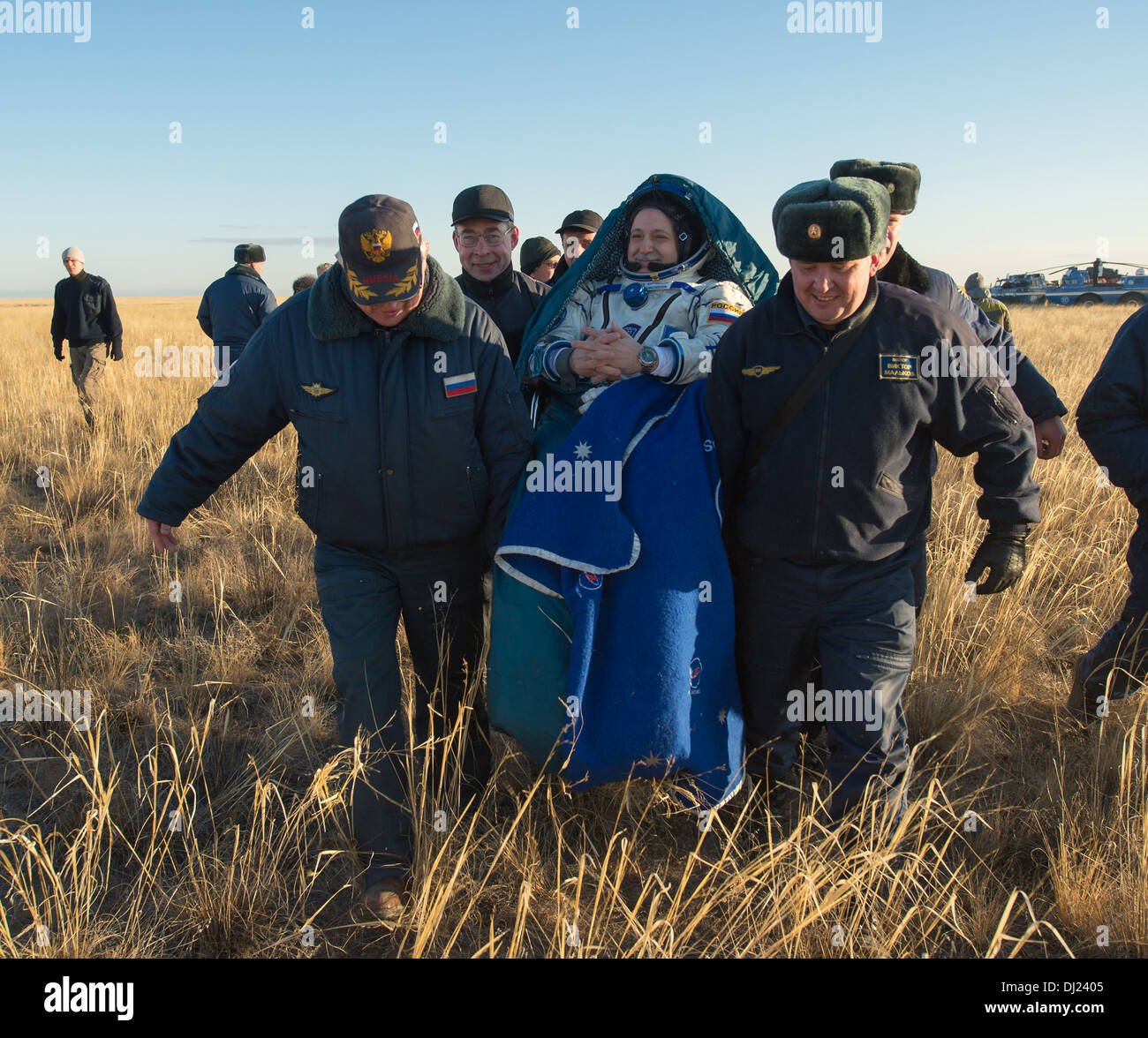 The crew of Expedition 37 returns to Earth after completing their ...