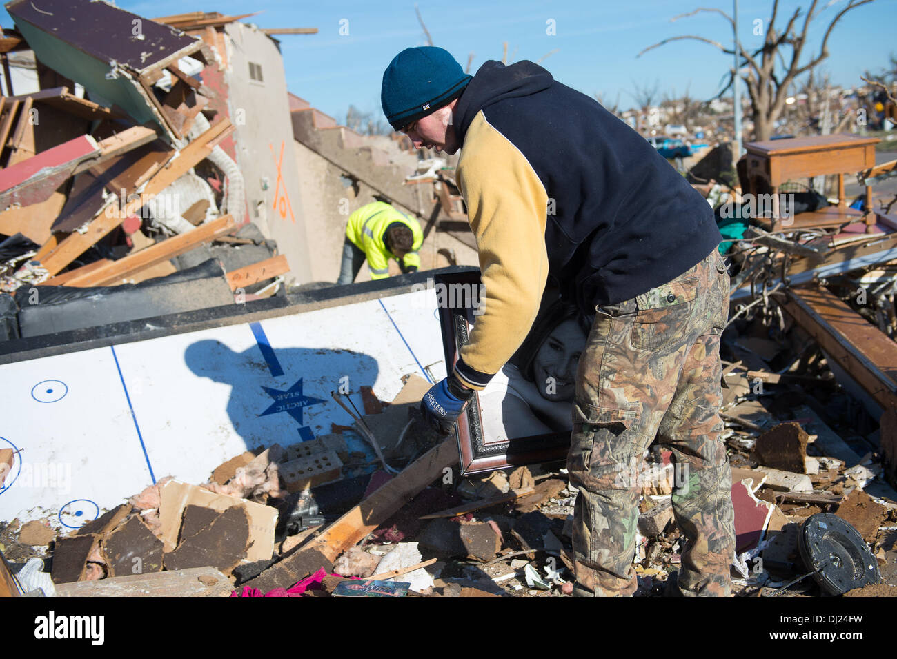 Washington, IL, USA. 19th Nov, 2013. Chase Sharp pulls out a family ...