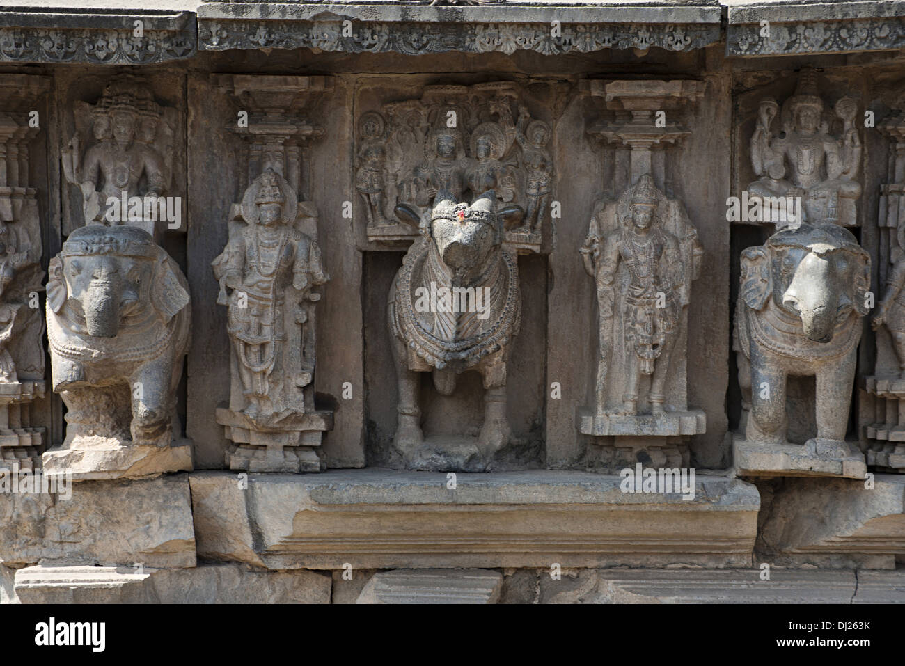 Kopeshwar temple. Brahma, Vishnu and Mahesh (Shiva) riding elephants ...