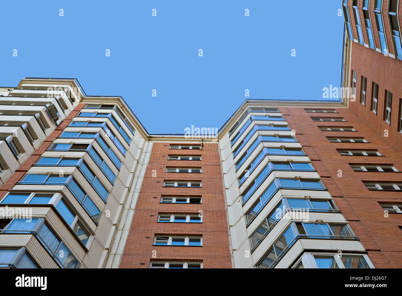 A residential multistory house and sky, view from below Stock Photo - Alamy