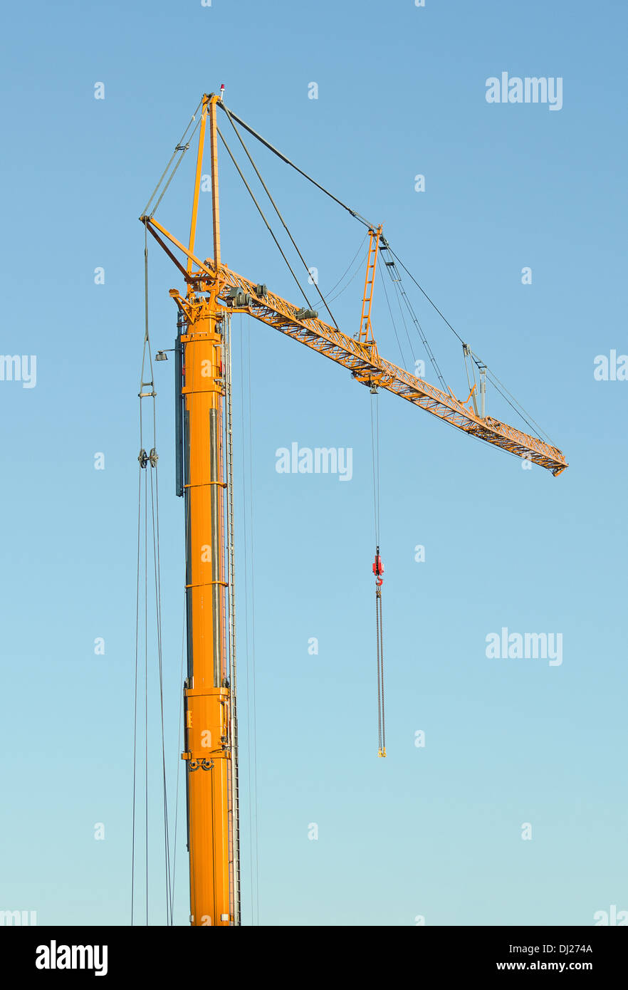 Crane on construction site Stock Photo - Alamy