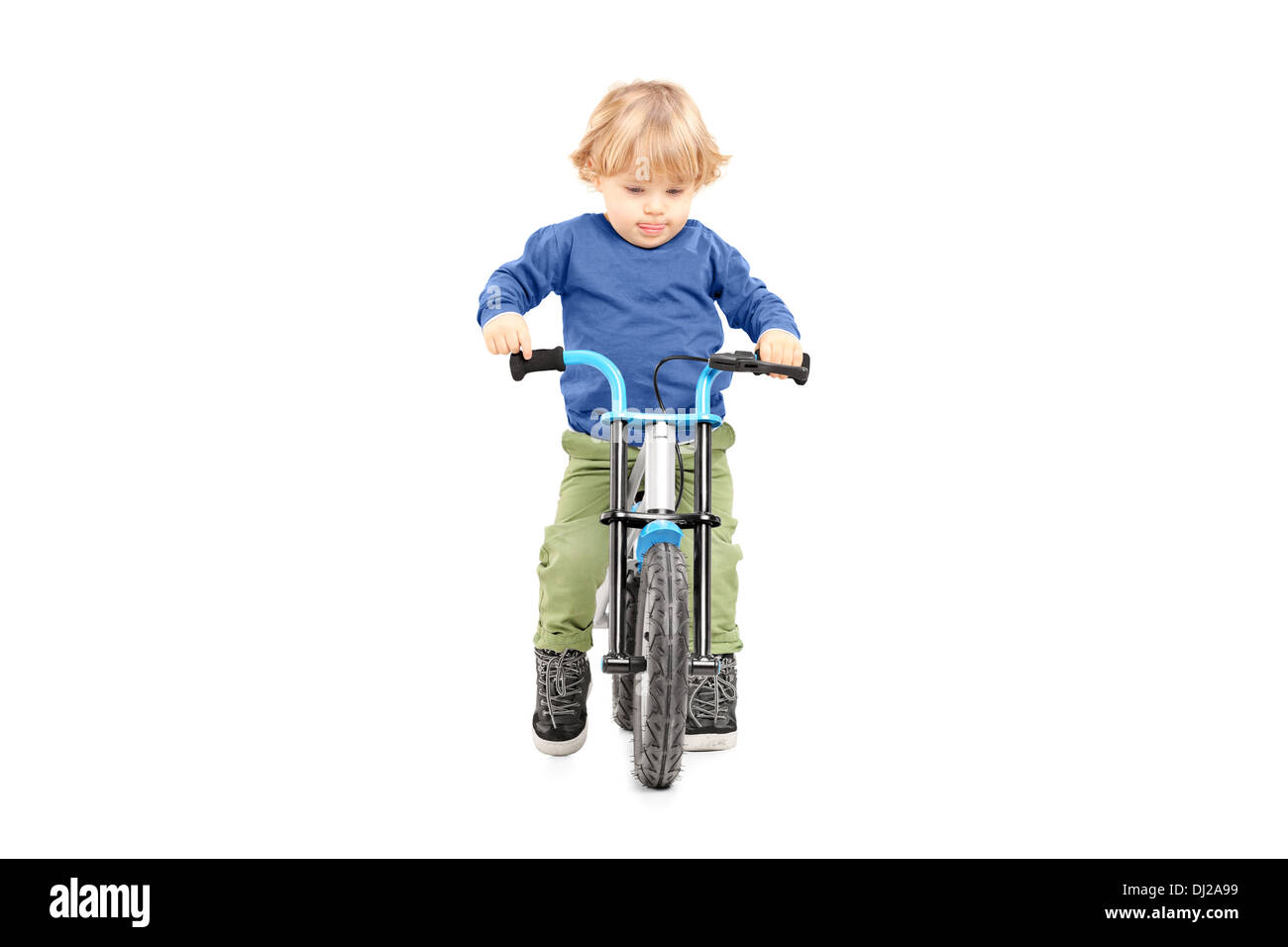 Cute male kid riding his bicycle Stock Photo - Alamy