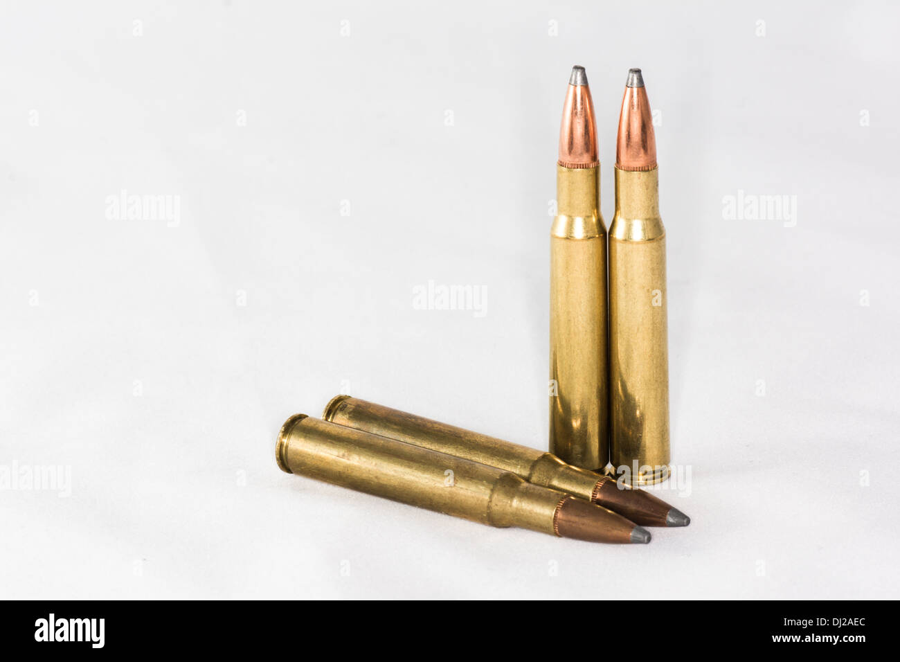 A few rifle bullets on white background with details Stock Photo - Alamy
