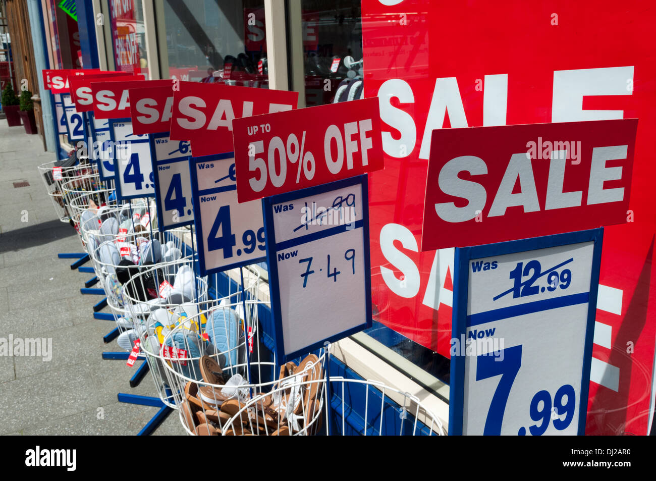 High street sale signs Stock Photo - Alamy