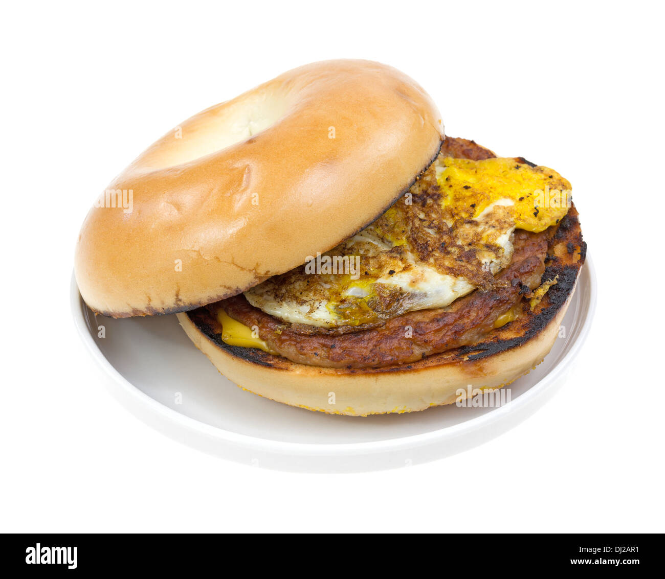 A bagel breakfast sandwich with sausage, egg and cheese on a small ...