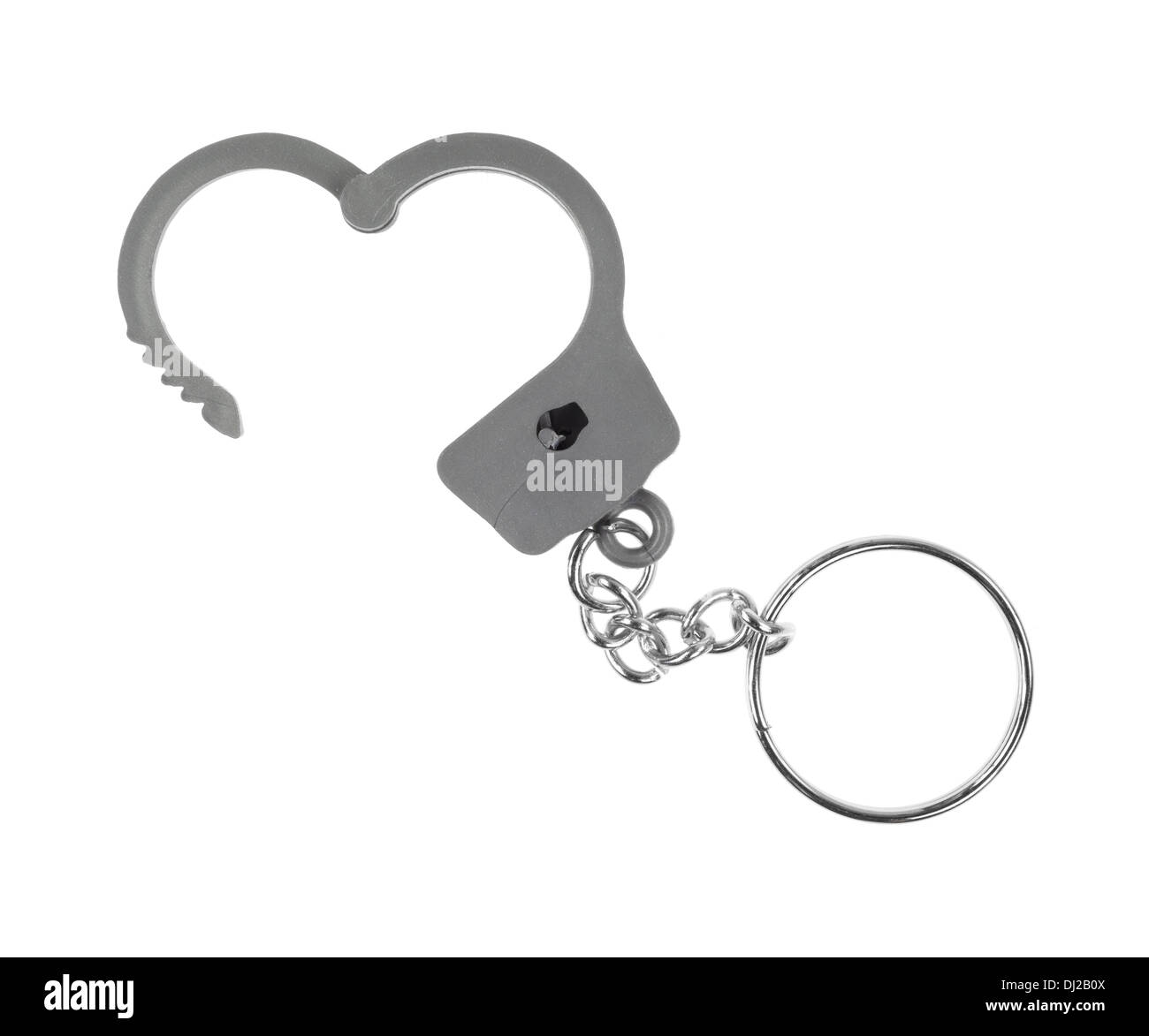 A plastic toy keychain in the shape of handcuffs that are opened on a ...