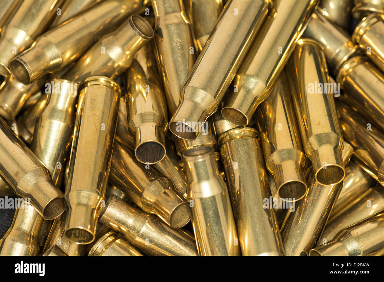 Abstract of pile of empty bullet shells with details Stock Photo - Alamy