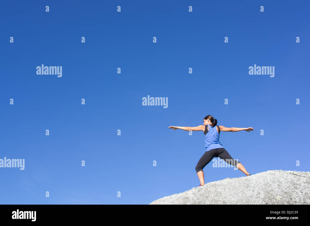 Warrior pose on rock hi-res stock photography and images - Alamy
