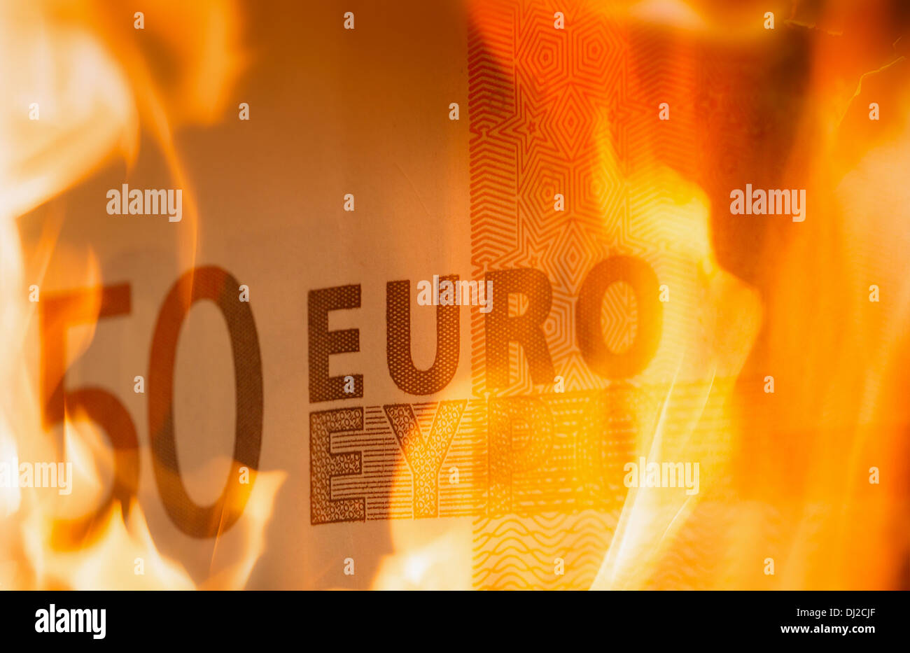 euro banknotes burning Stock Photo - Alamy