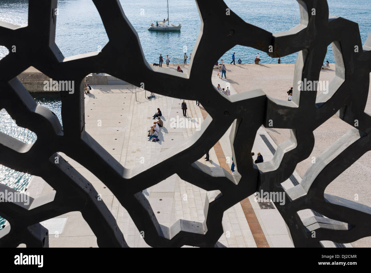 Marseille MUCEM museum concrete wall and vieux port sea Stock Photo - Alamy