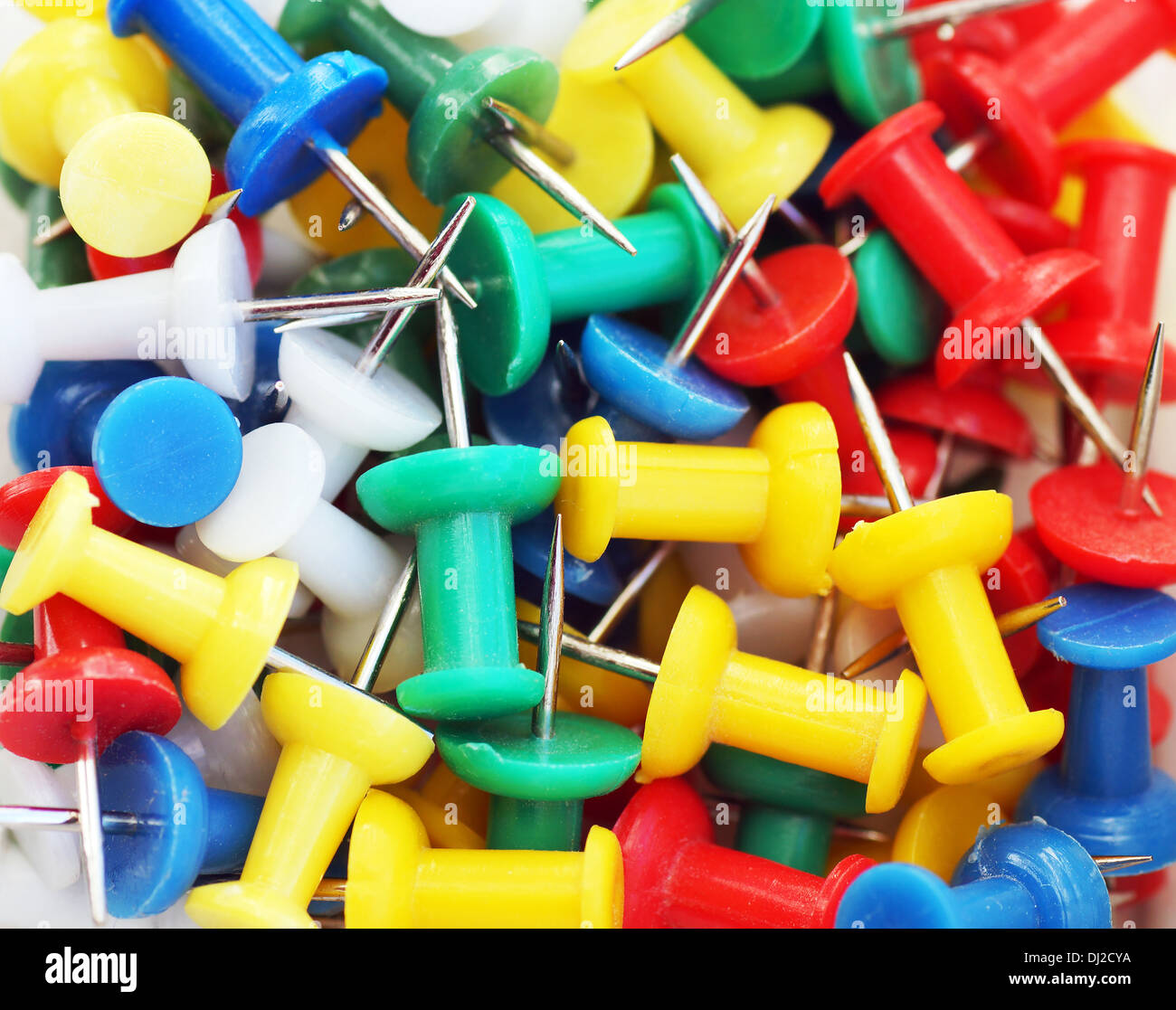 Colorful push pin or thumbtack macro background Stock Photo - Alamy