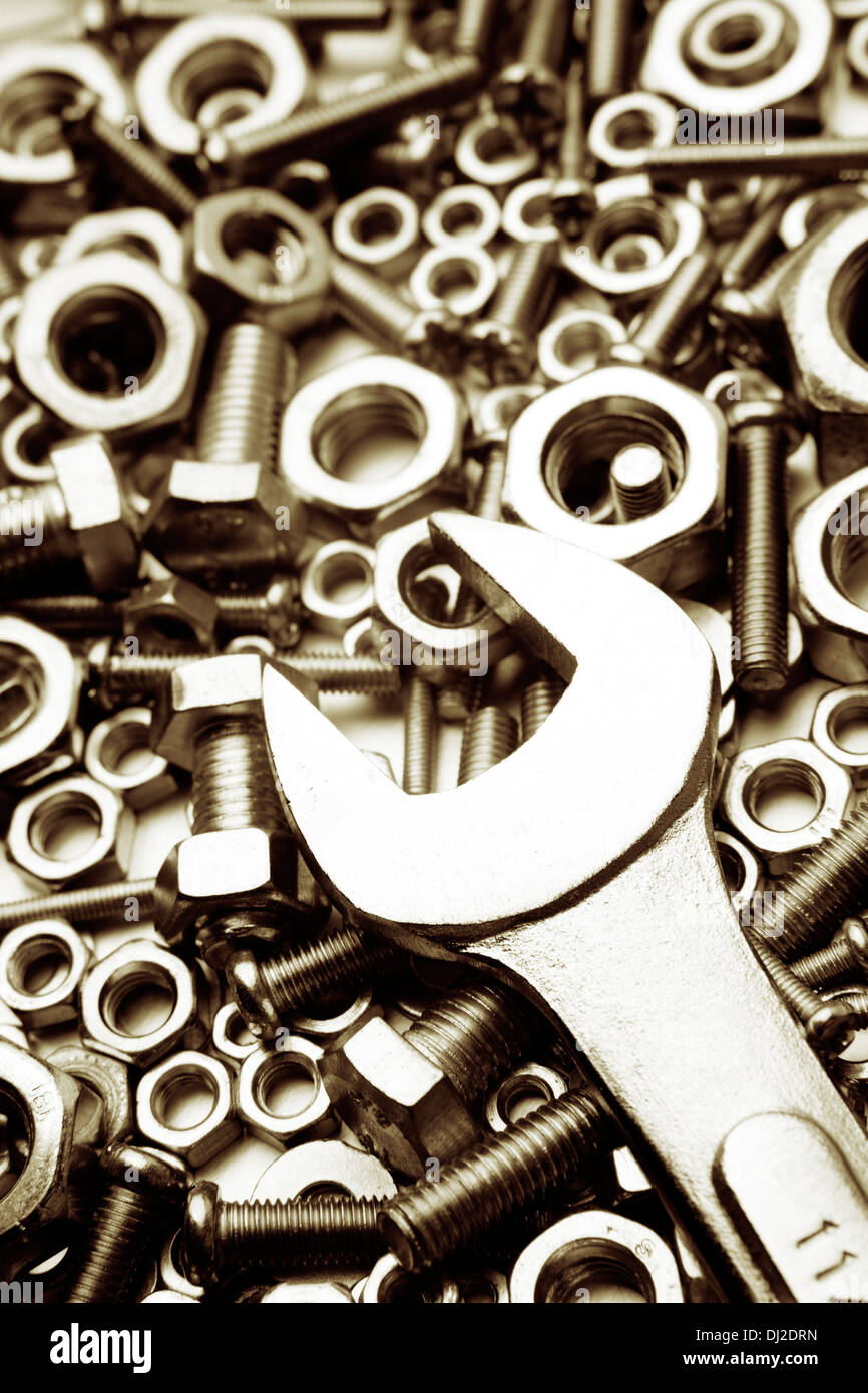 Wrench on nuts and bolts Stock Photo - Alamy