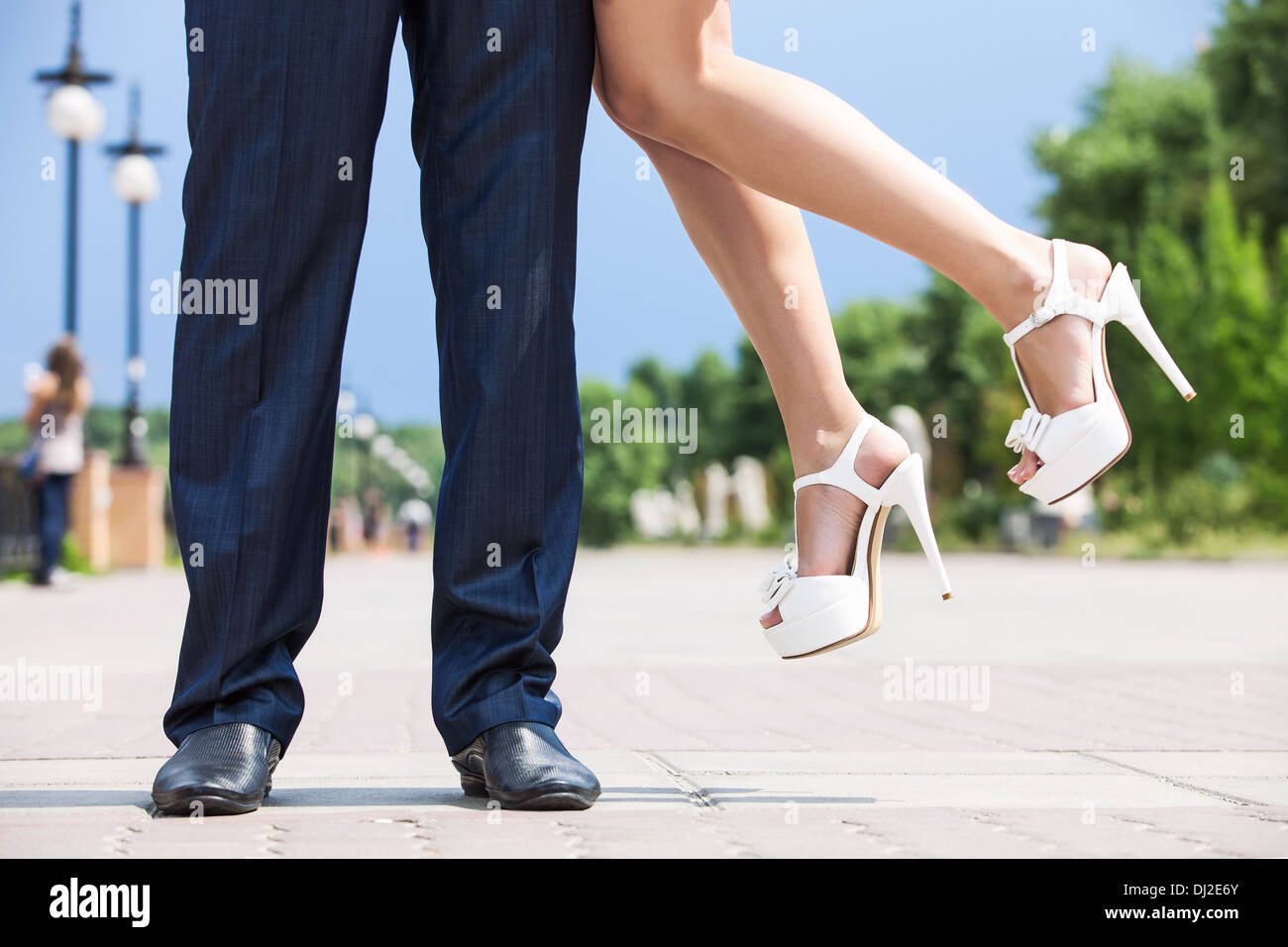 Man lifting up woman feet hi-res stock photography and images - Alamy