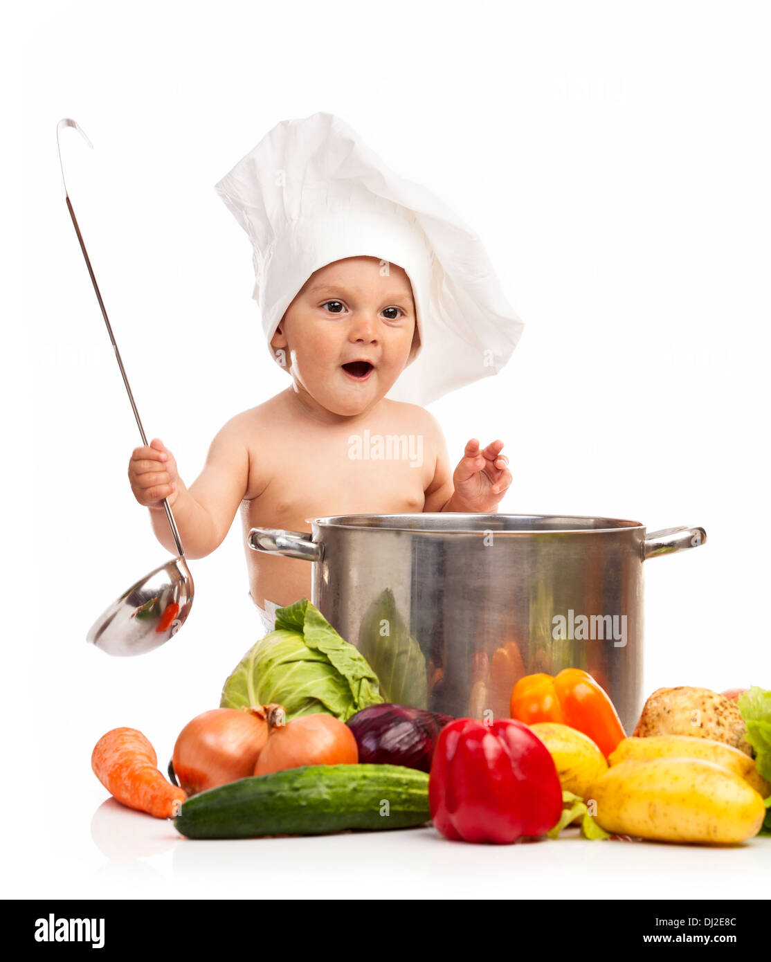 Happy little boy in chef's ha Stock Photo - Alamy