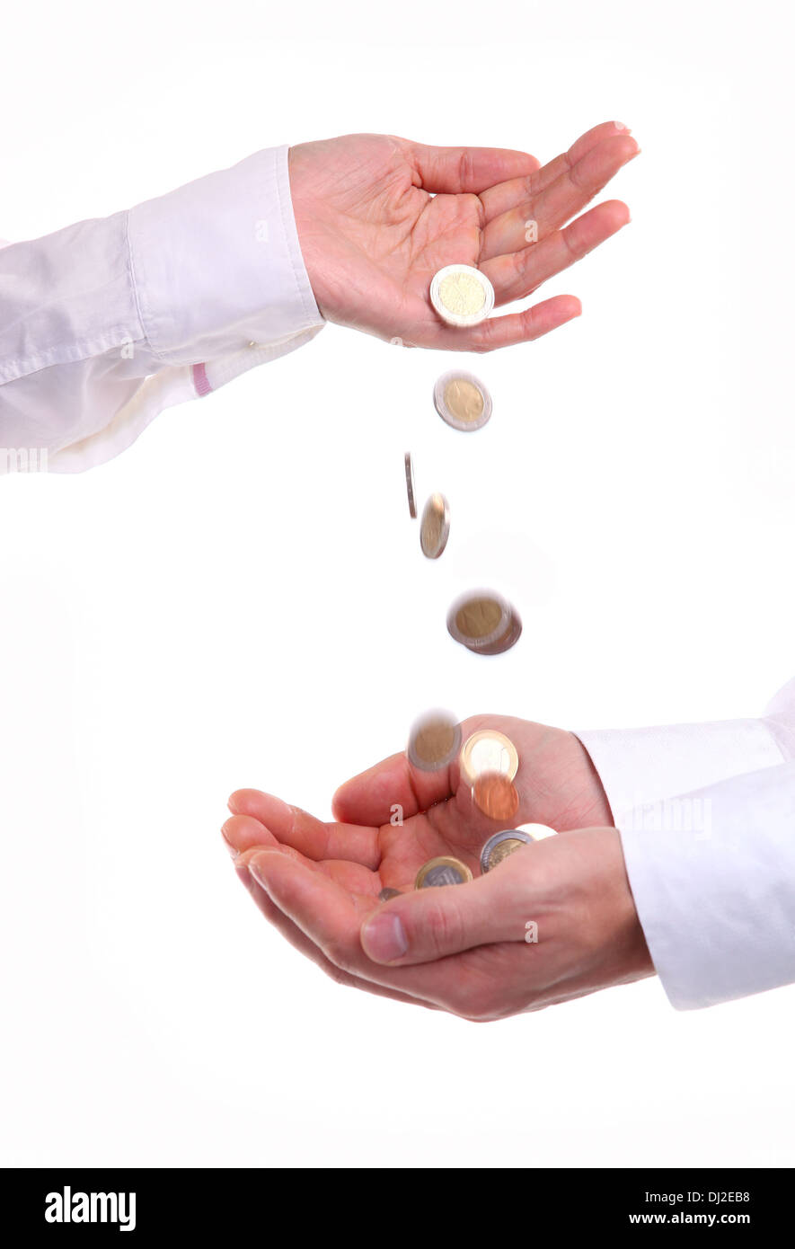 Hands coins cash money Cut Out Stock Images & Pictures - Alamy