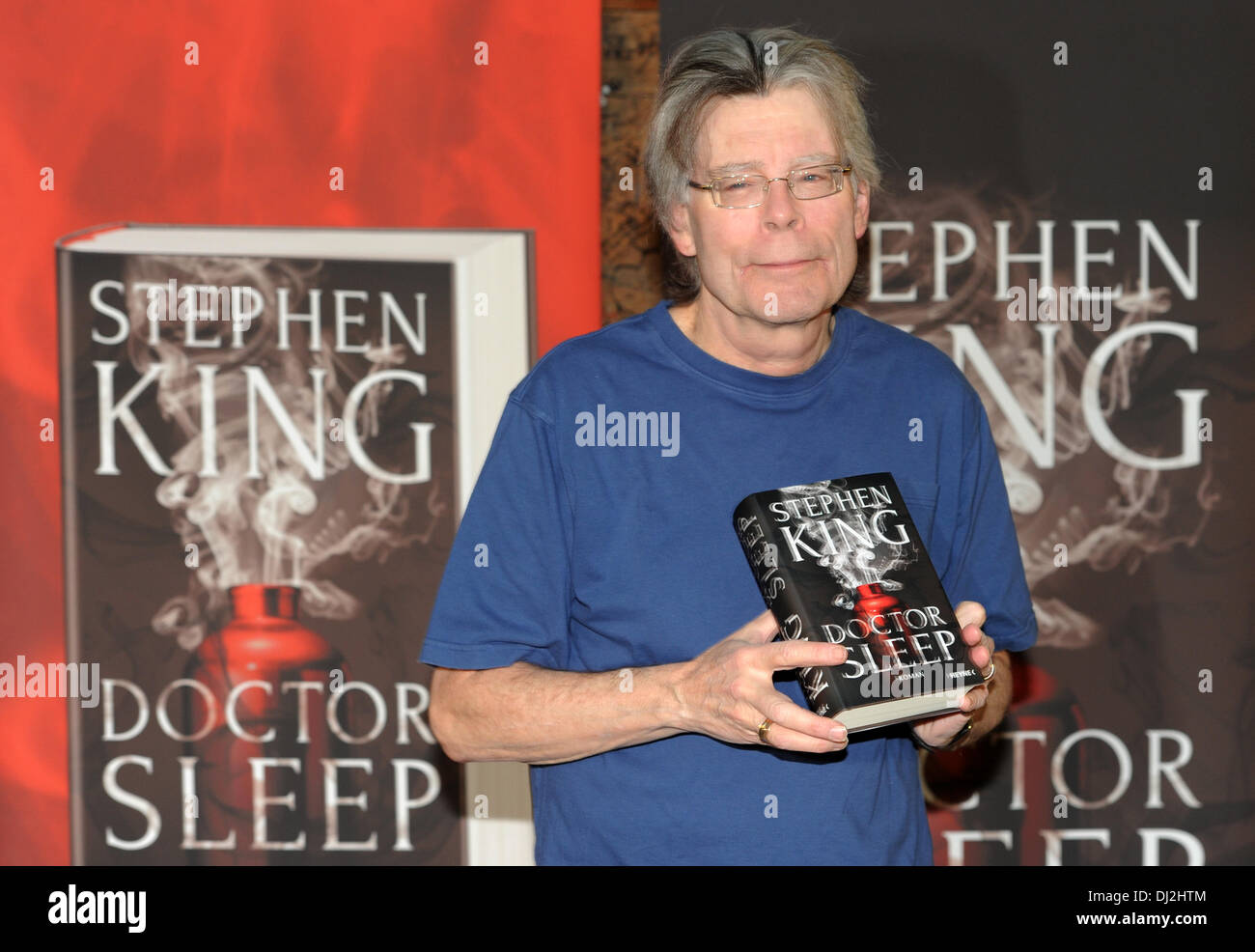 Munich, Germany. 19th Nov, 2013. US author Stephen King holds his new ...