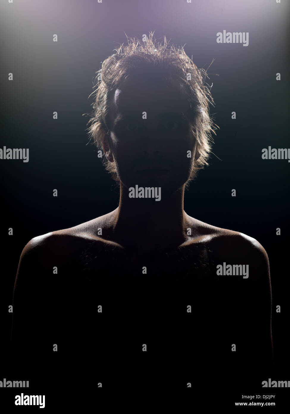 Looking at camera dramatic lighting hi-res stock photography and images ...