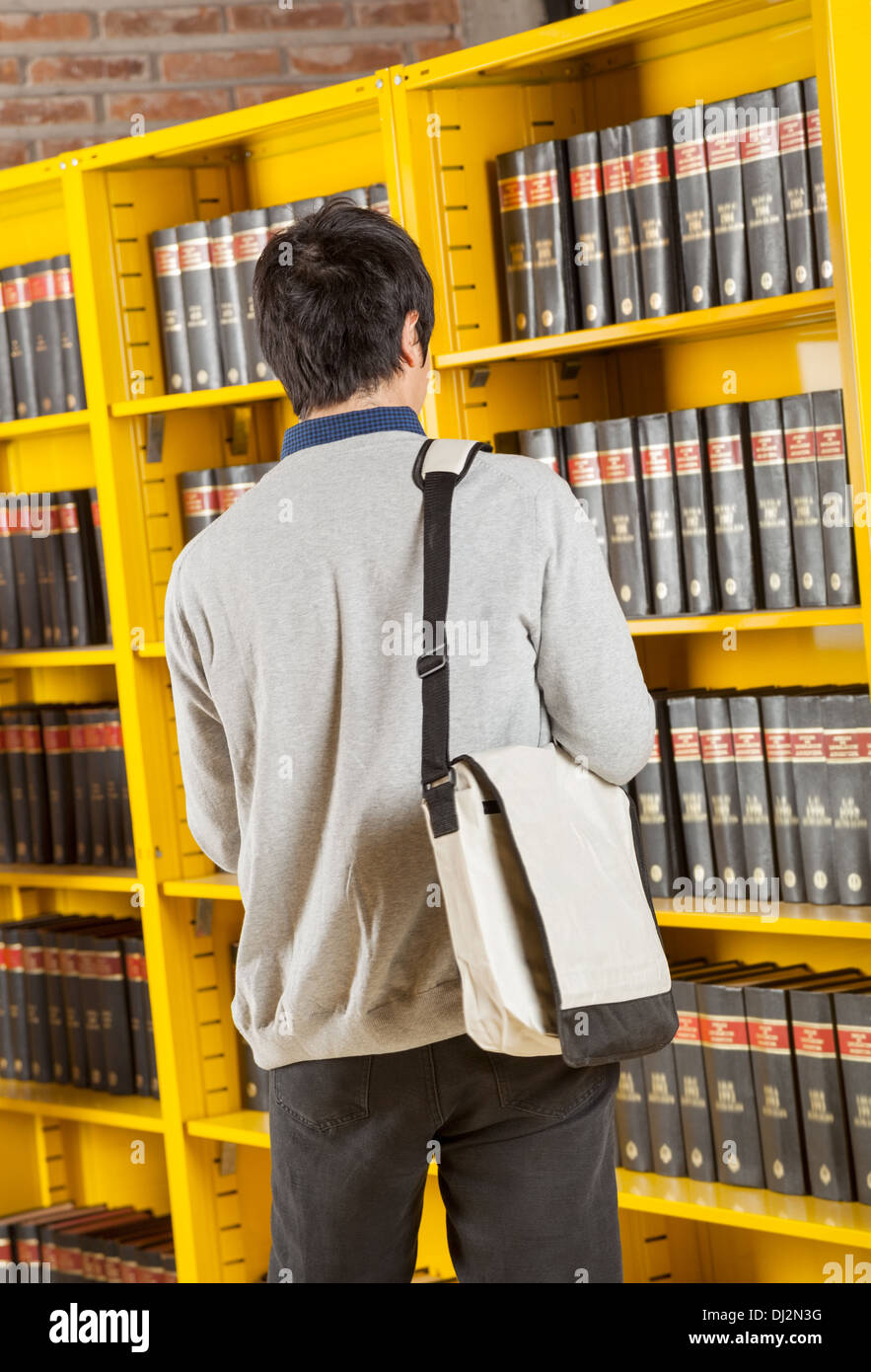 Student Carrying Too Many Books