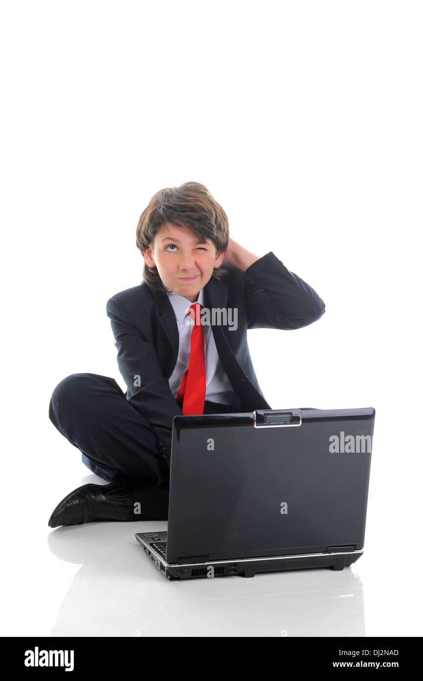 boy in business suit sitting in front of computer Stock Photo - Alamy