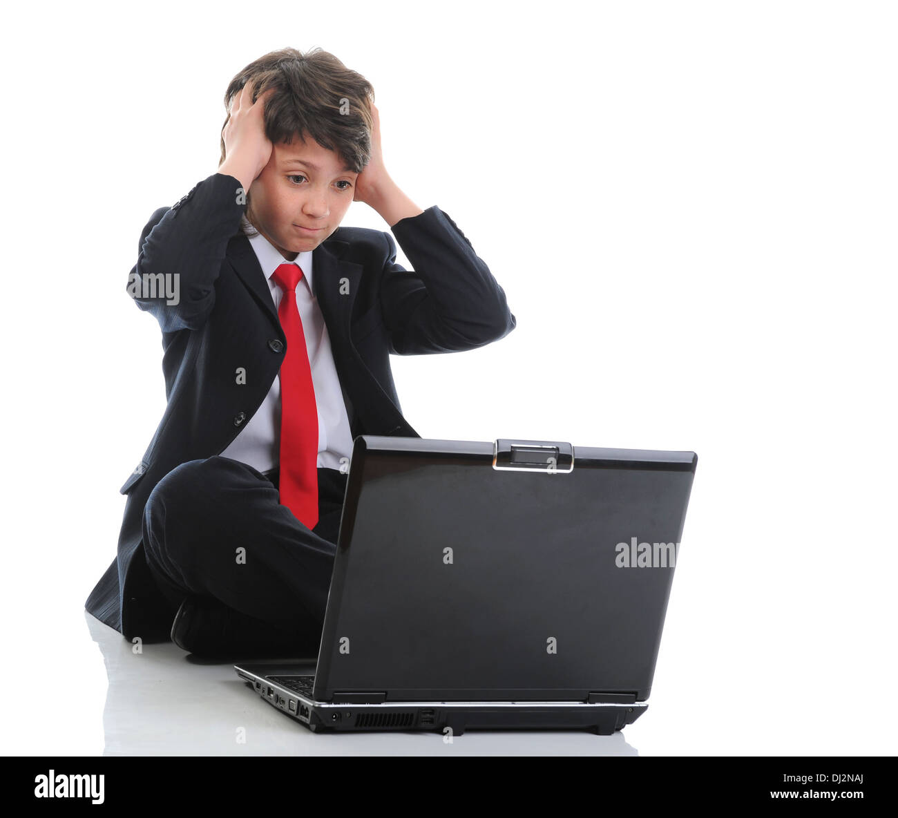 boy in business suit sitting in front of computer Stock Photo - Alamy