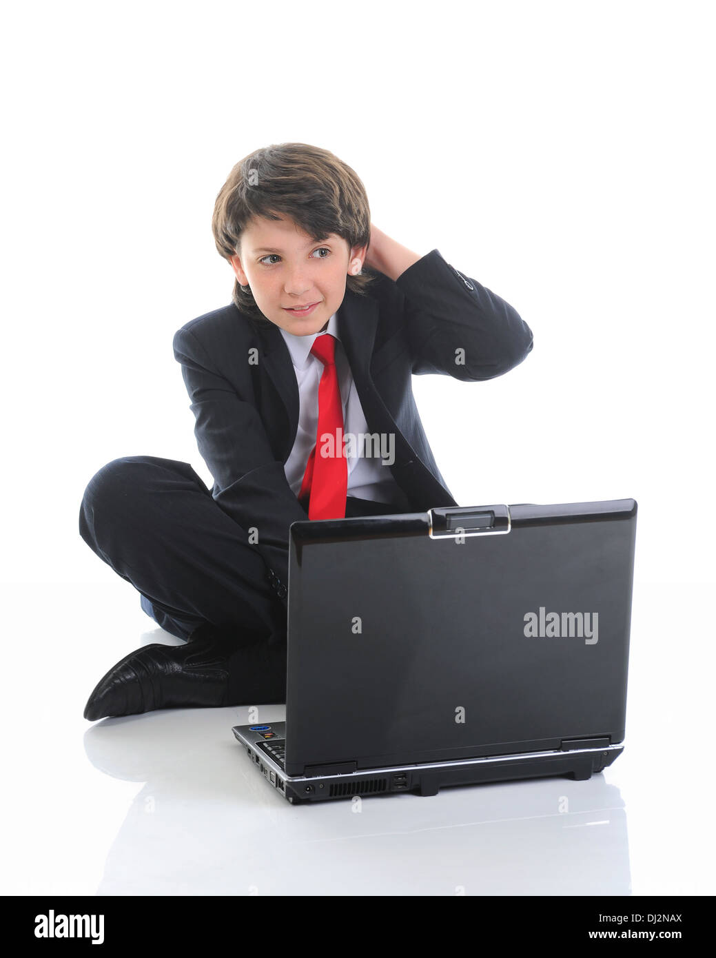 boy in business suit sitting in front of computer Stock Photo - Alamy