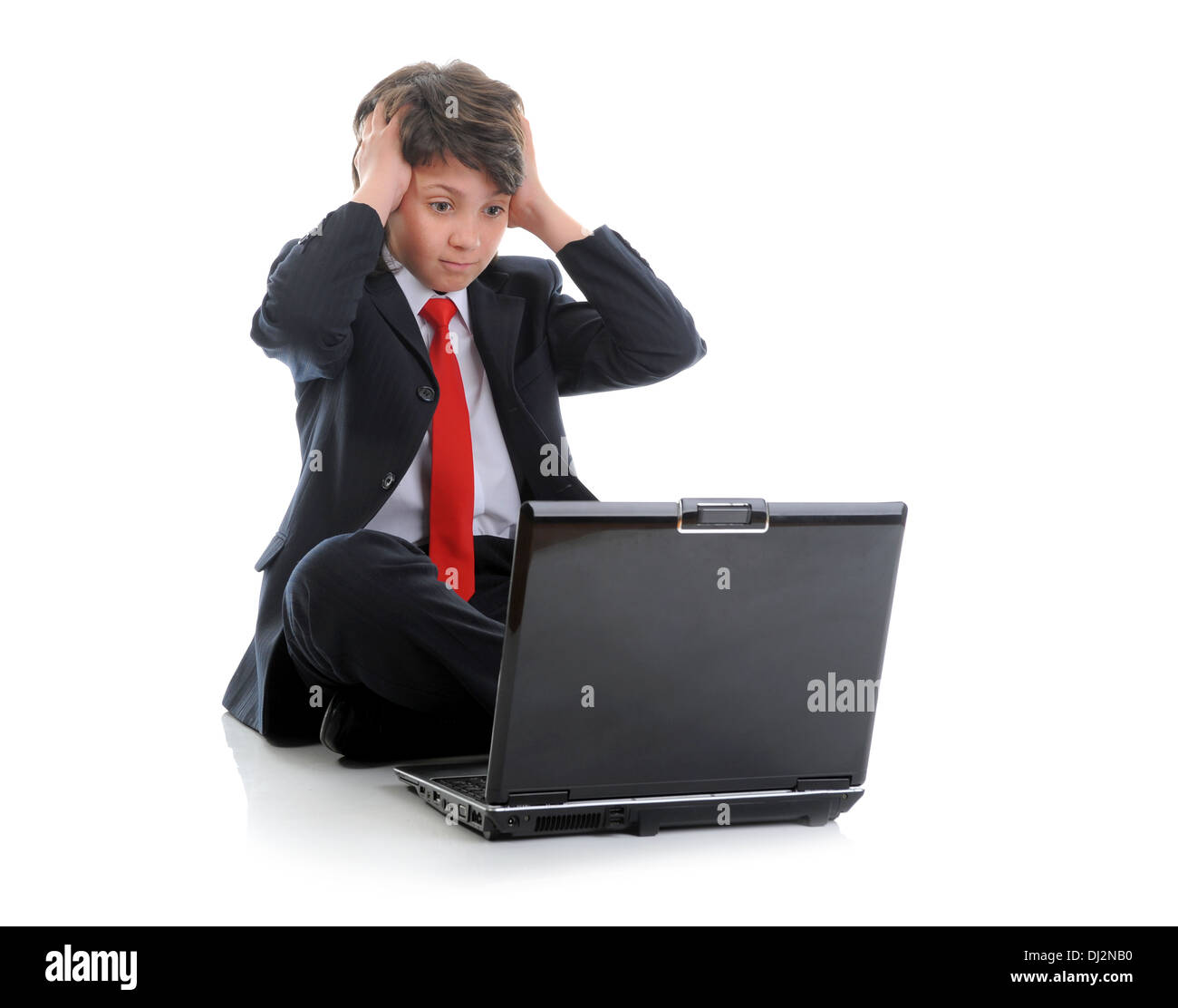 boy in business suit sitting in front of computer Stock Photo - Alamy