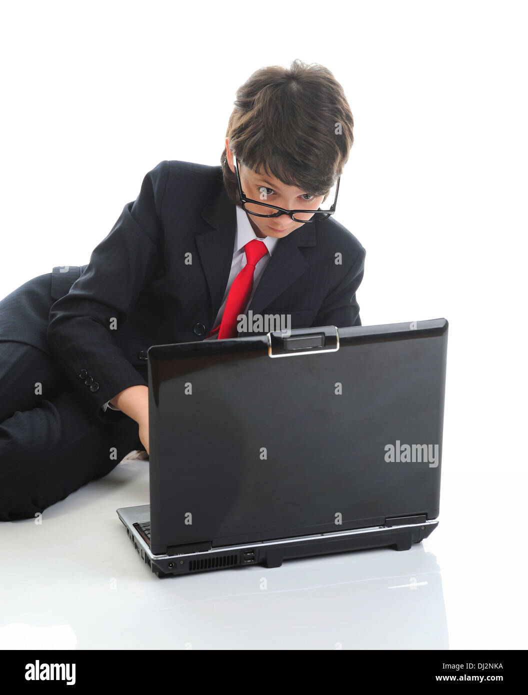 boy in business suit sitting in front of computer Stock Photo - Alamy