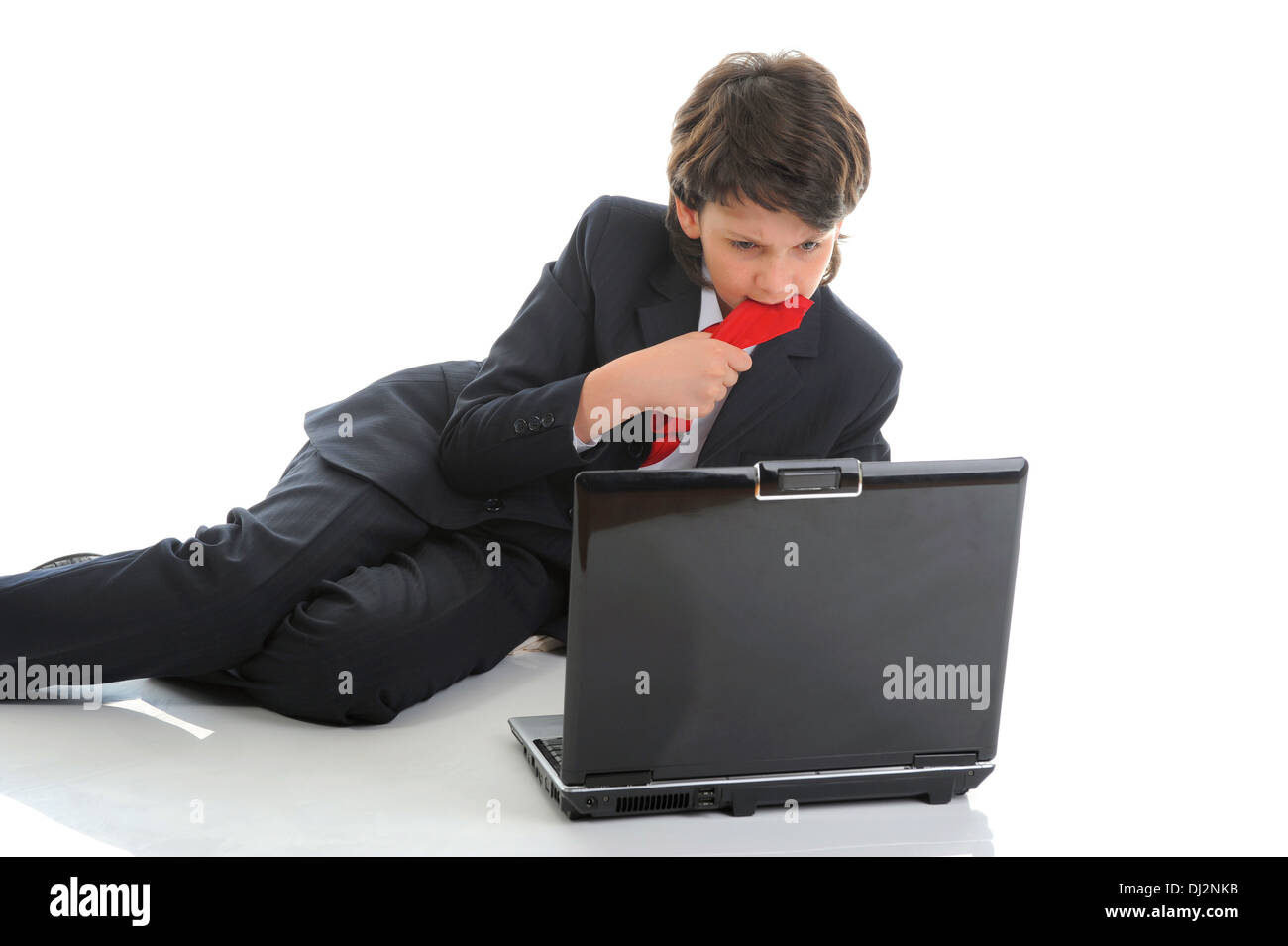 boy in business suit sitting in front of computer Stock Photo - Alamy
