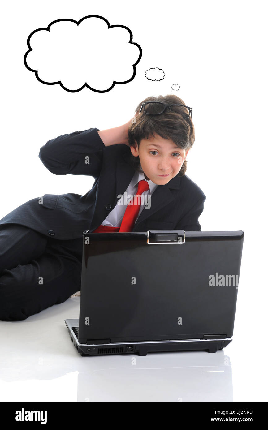 boy in business suit sitting in front of computer Stock Photo - Alamy